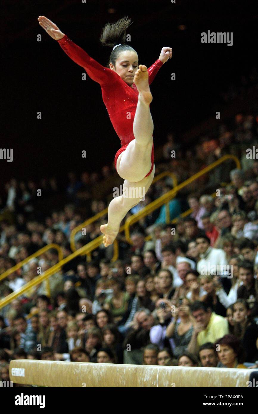 Canadian Elyse Hopfner-Hibbs competes at the beam, during the 24th ...