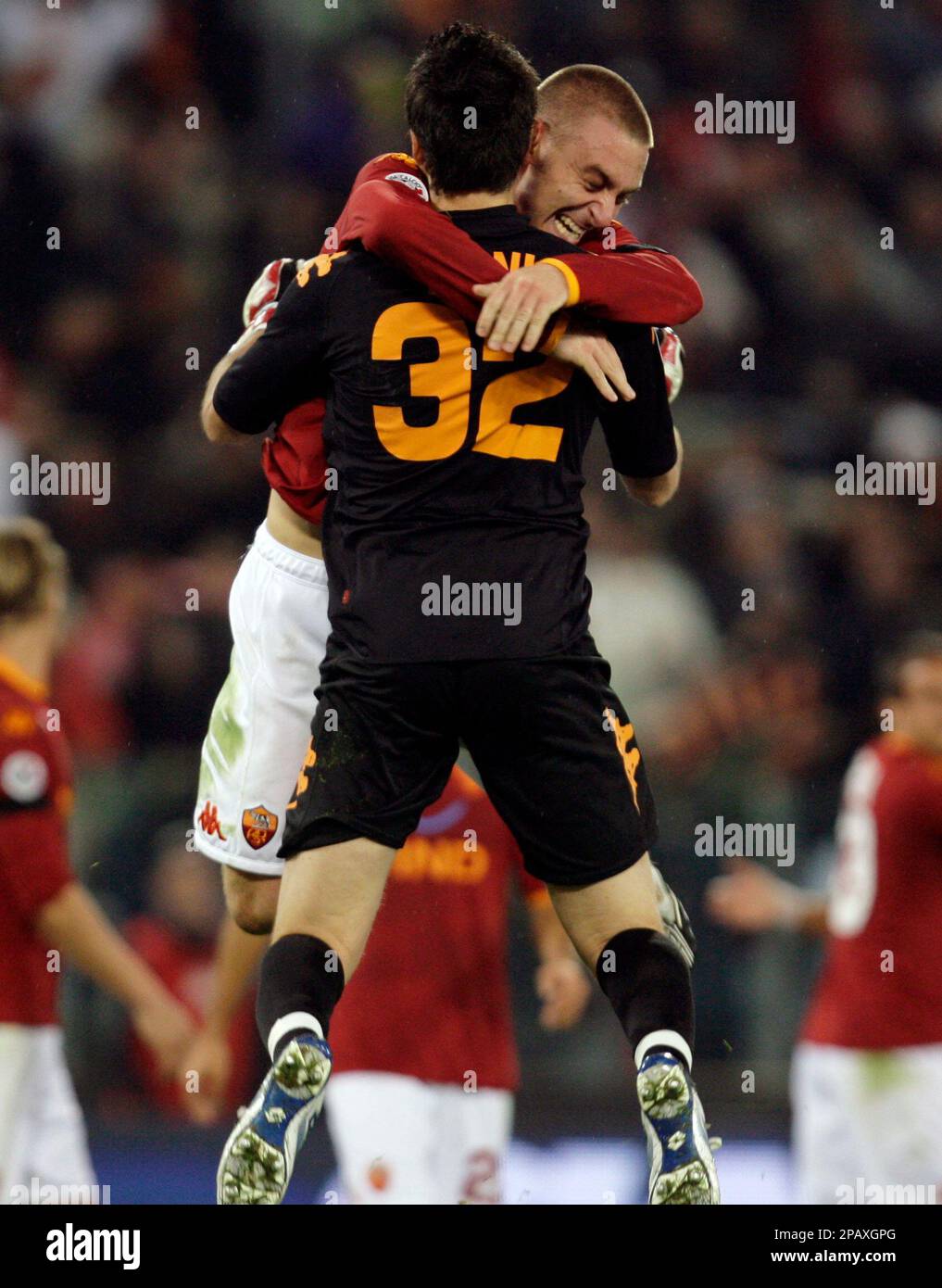 AS Roma's Daniele de Rossi, face to camera, celebrates with AS Roma ...