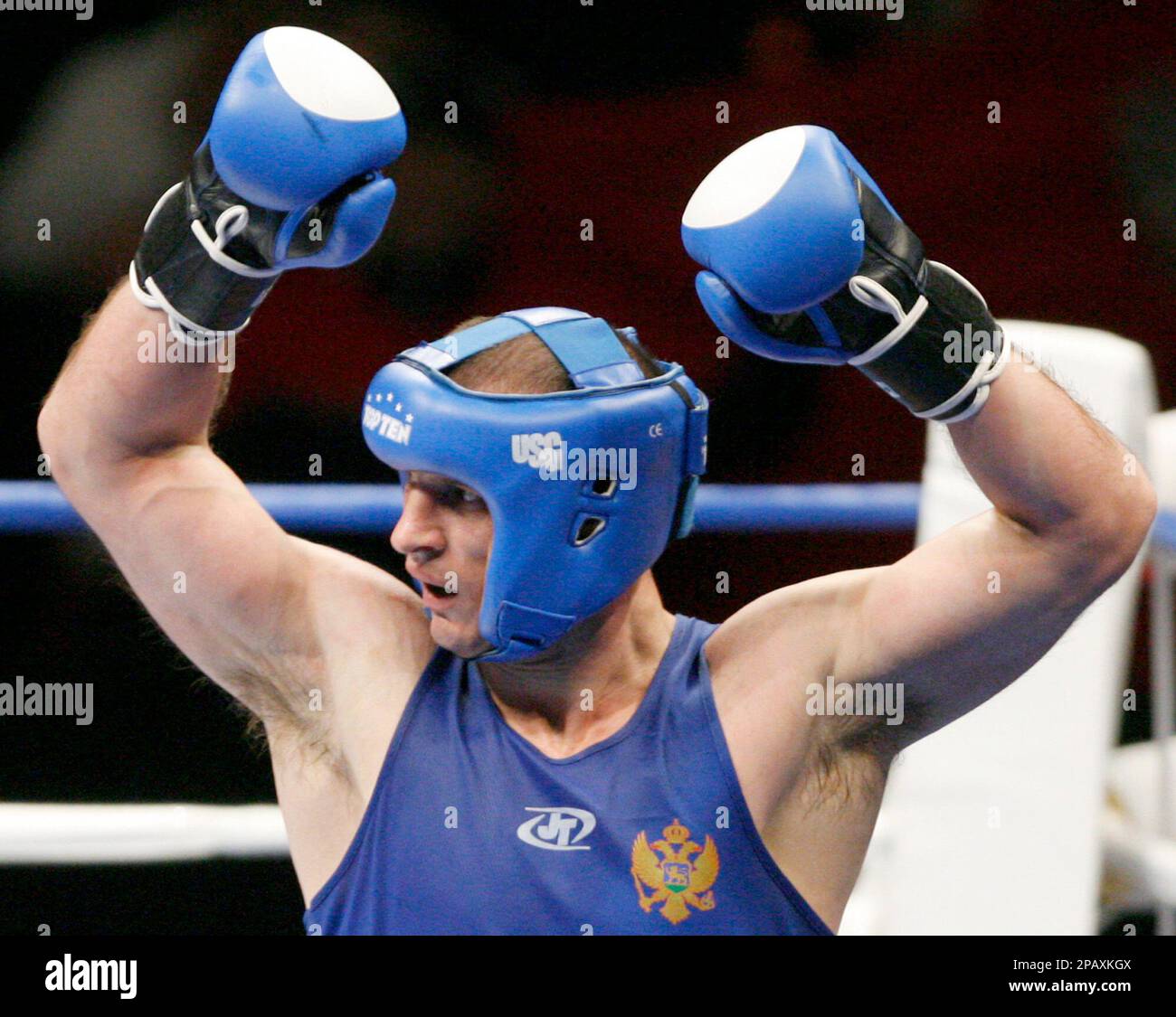 Milorad Gajovic, of Montenegro, celebrates after he knocked out ...