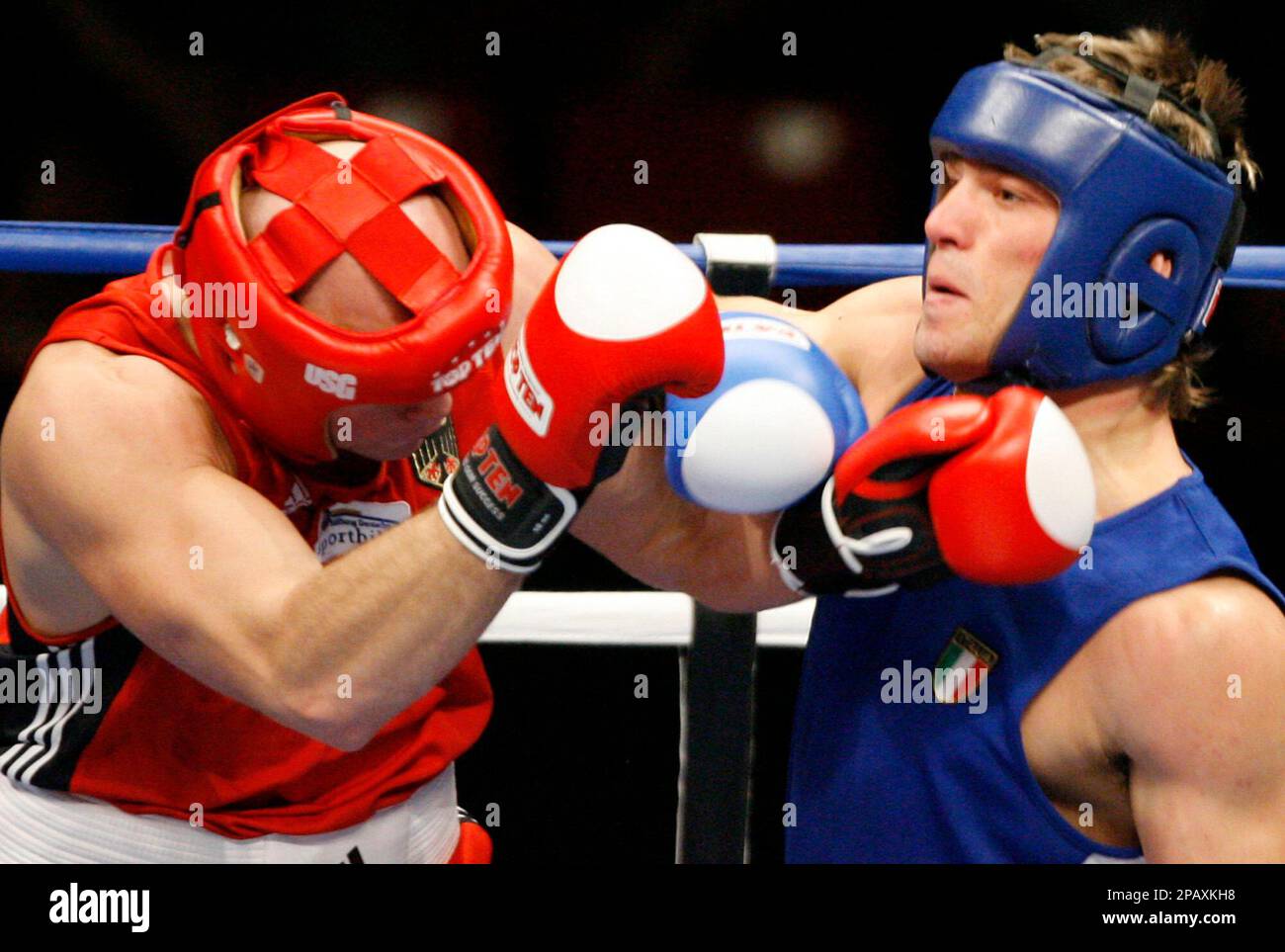 Alexander Yushan, left, of Germany, and Clemente Russo of Italy, battle ...