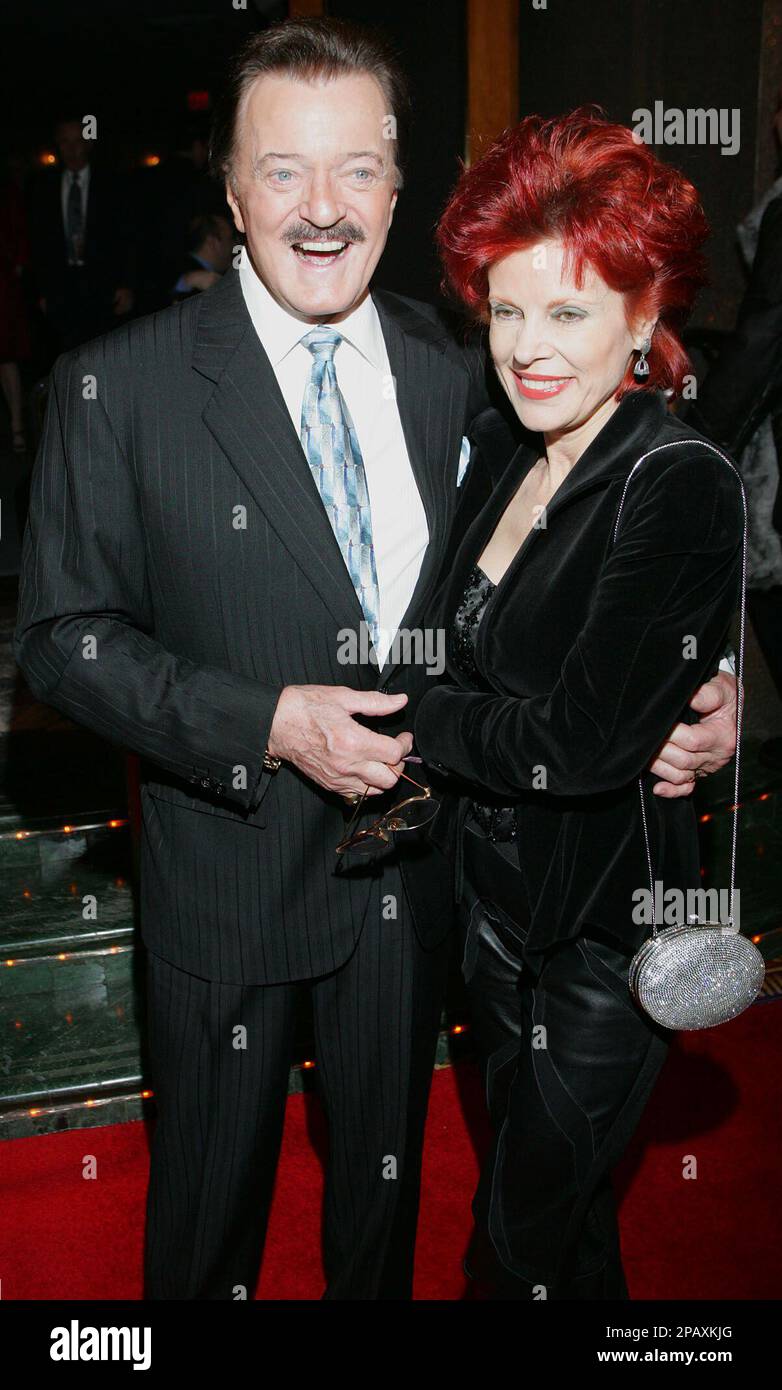 ** FILE ** Robert Goulet and his wife Vera pose on the red carpet ...
