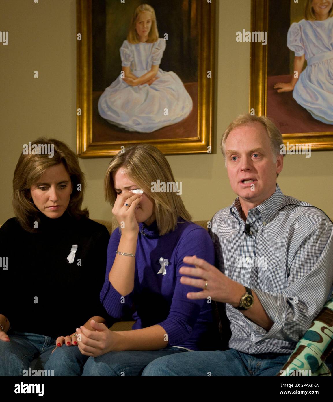 Meredith Yelton, center, reacts as her father Jeff Yelton talks about ...