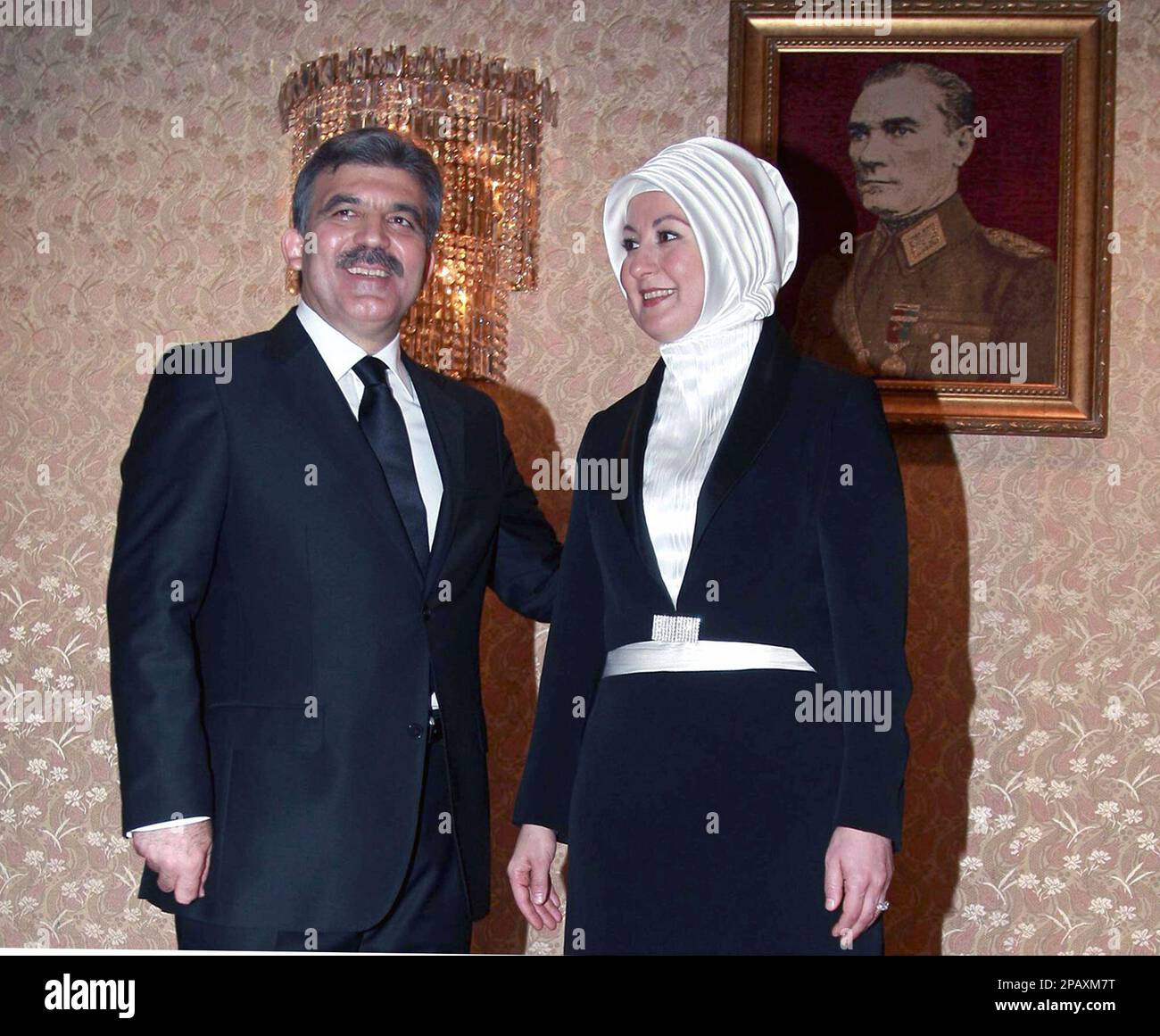 Turkish President Abdullah Gul and his wife Hayrunnisa Gul wait for ...