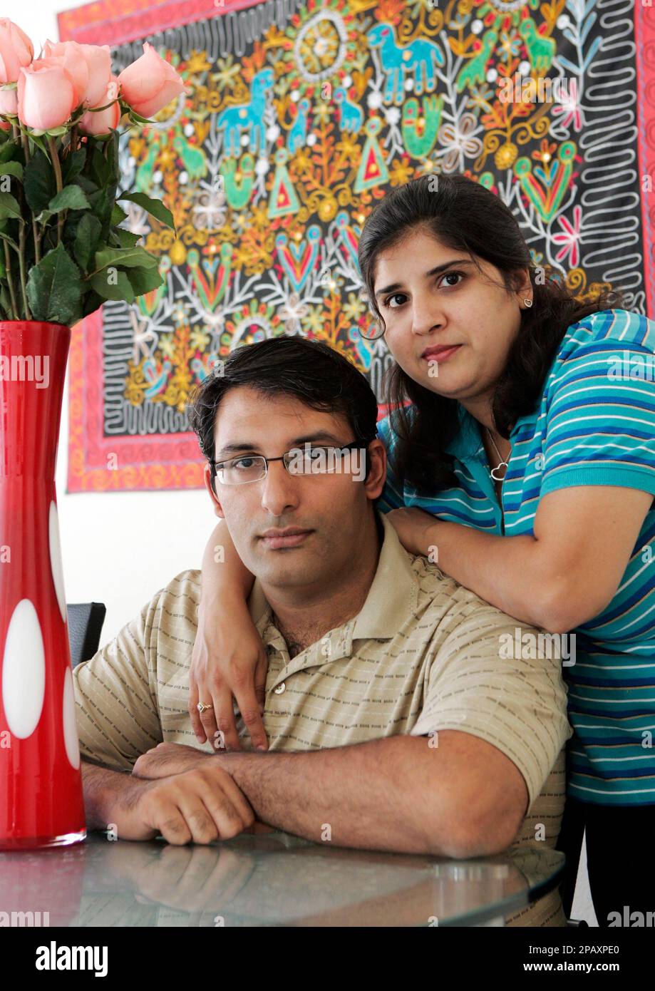 Sandeep and Preeti Bhatia are seen at their home in San Jose, Calif ...