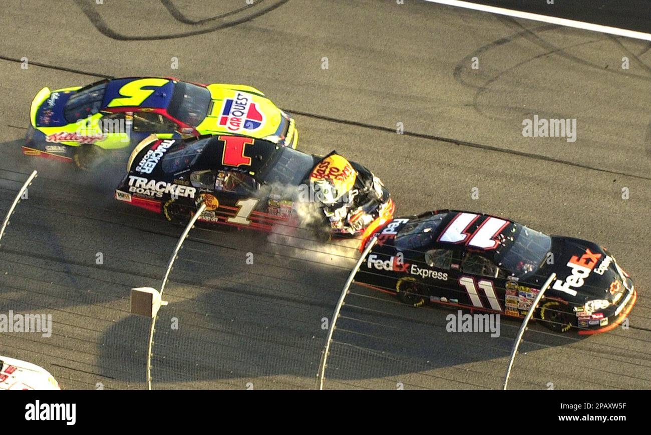 NASCAR drivers Denny Hamlin (11), Martin Truex Jr., (1) and Kyle Busch ...