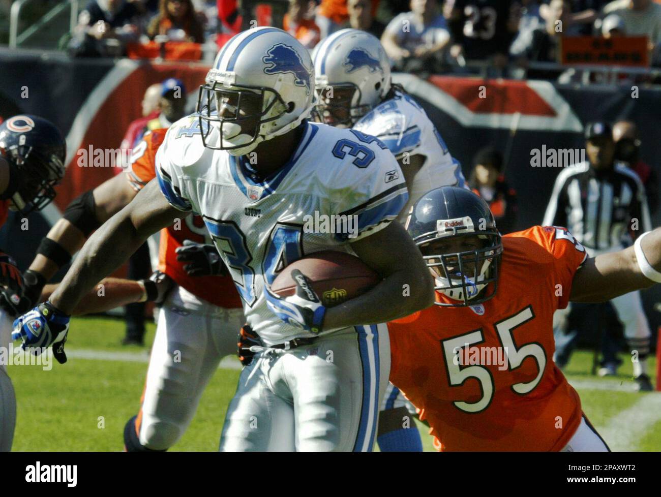 Detroit Lions running back Kevin Jones, left, carries the ball deep ...