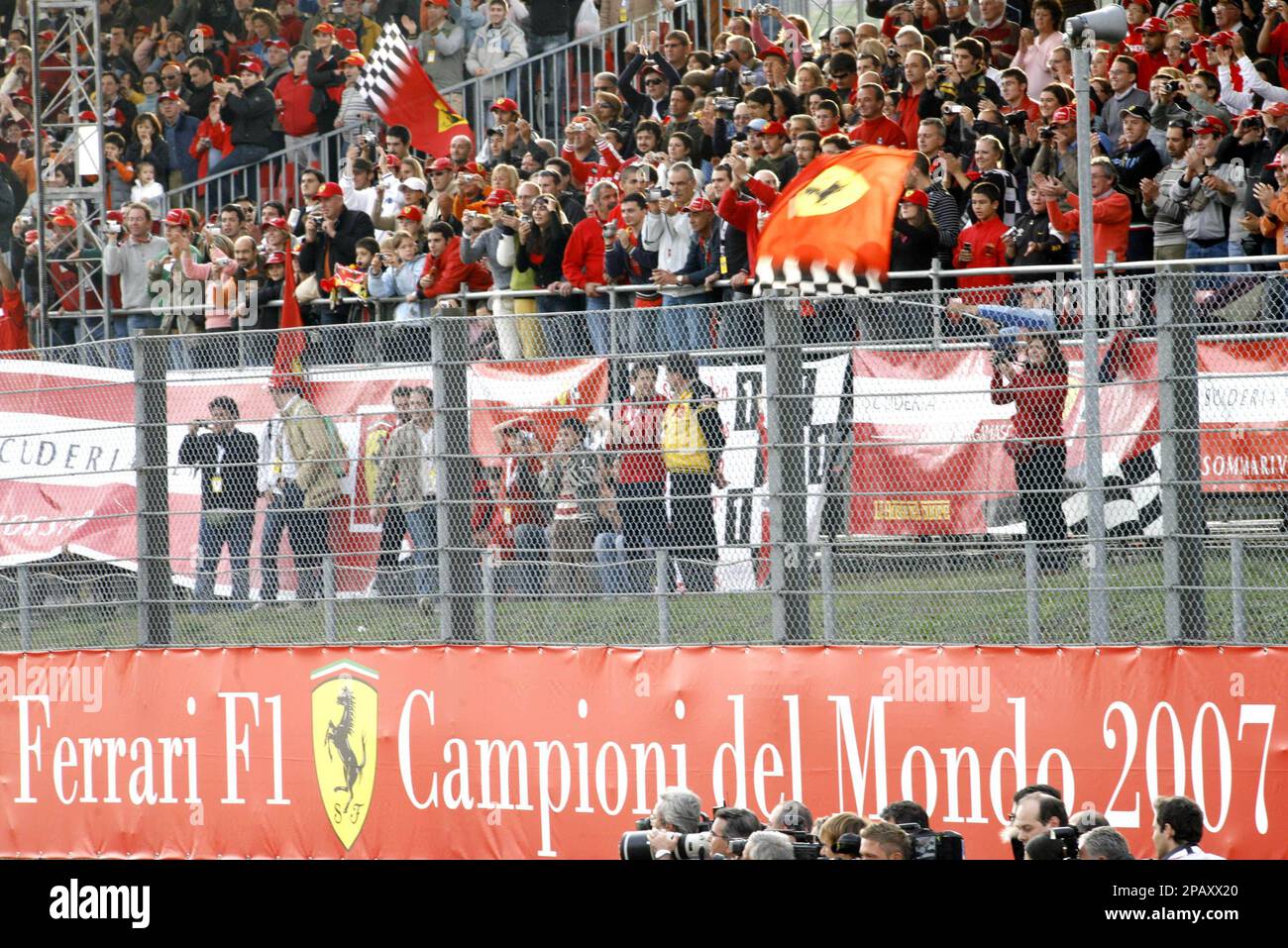 Ferrari supporters cheer at the the Ferrari World Finals event, to ...