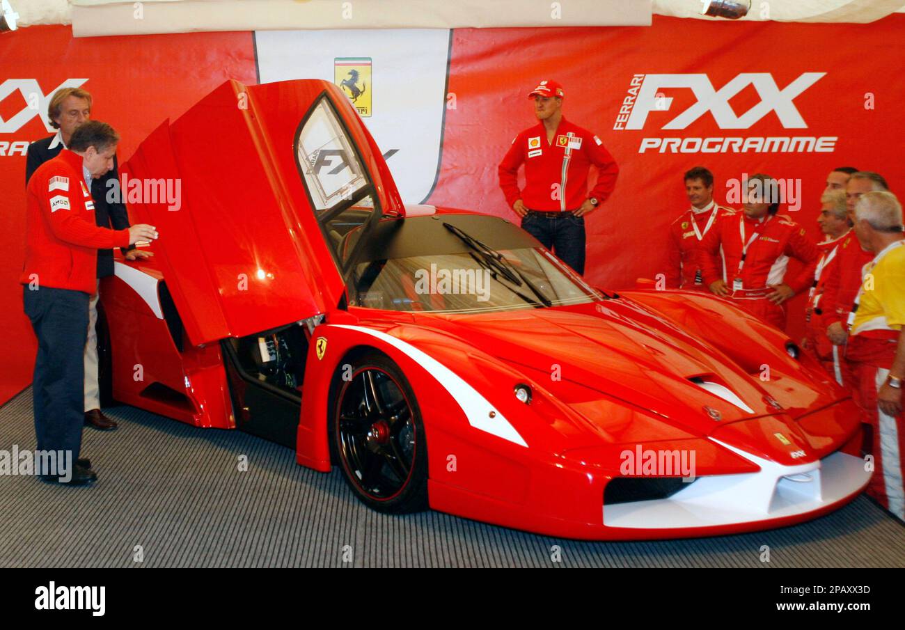 Ferrari CEO Jean Todt, foreground left, Ferrari president Luca Cordero ...