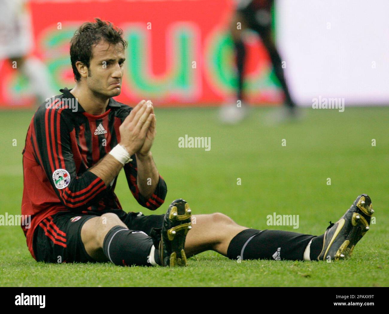 AC Milan forward Alberto Gilardino reacts after missing a scoring ...