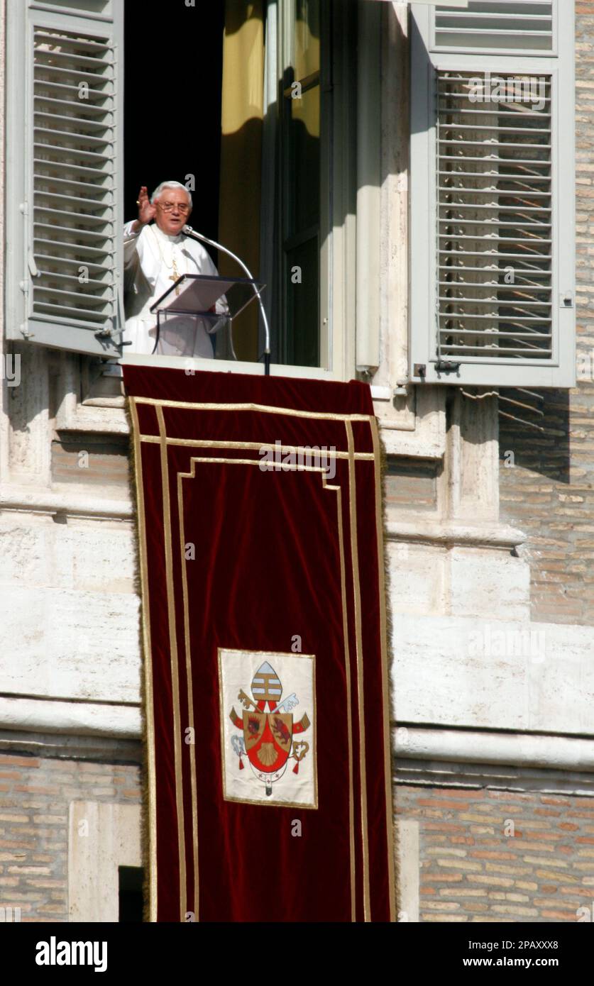 Pope Benedict XVI delivers his blessing during the Angelus noon prayer ...