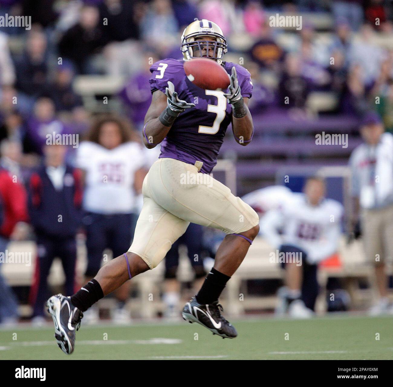 Washington's Marcel Reece is wide open as he catches a pass for a 98 ...