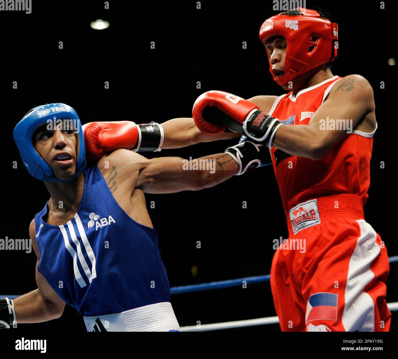 Violito Payla, right, of the Philippines, trades punches with Khalid ...