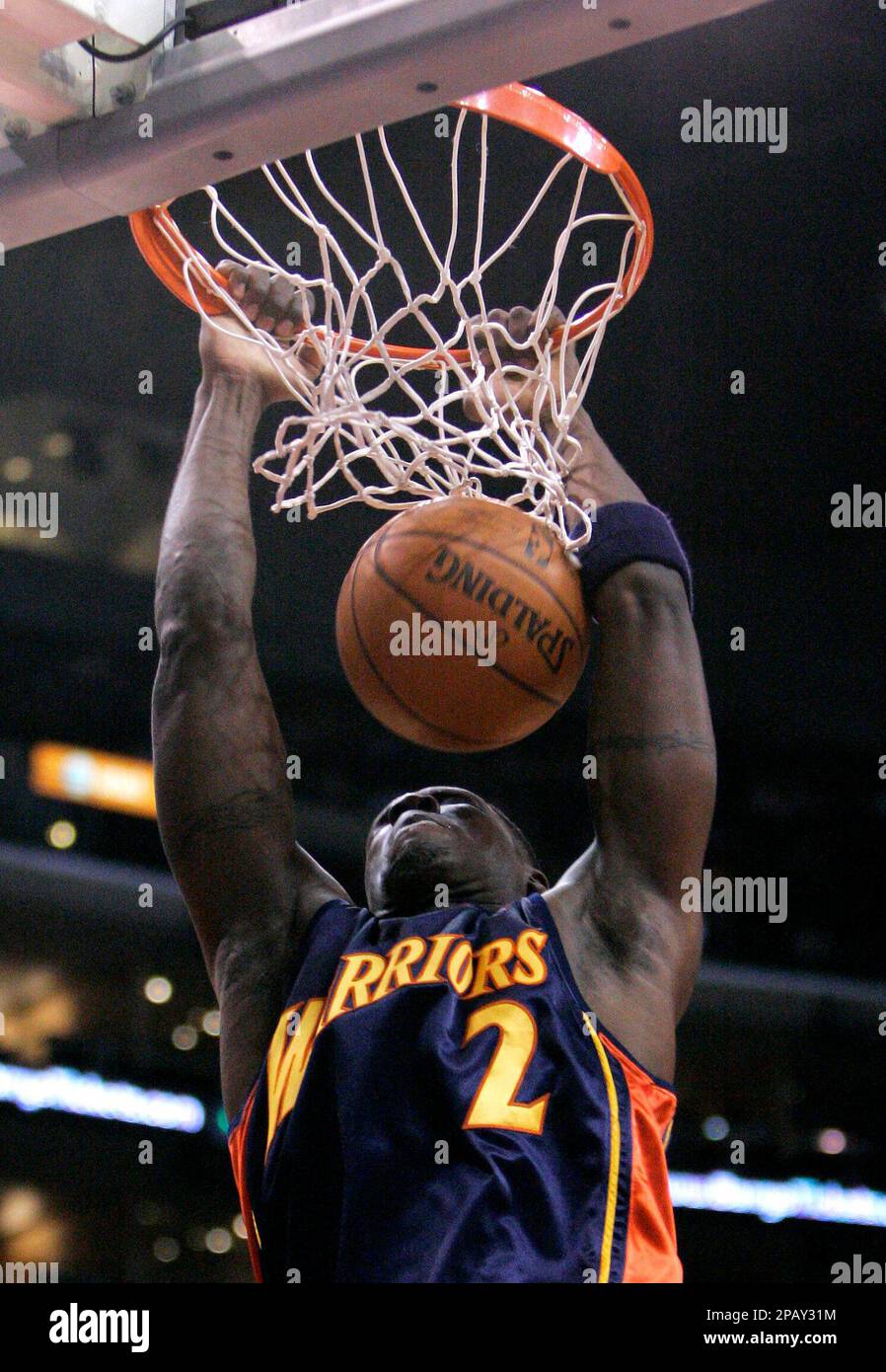 Golden State Warriors' Mickael Pietrus dunks the ball during the first ...