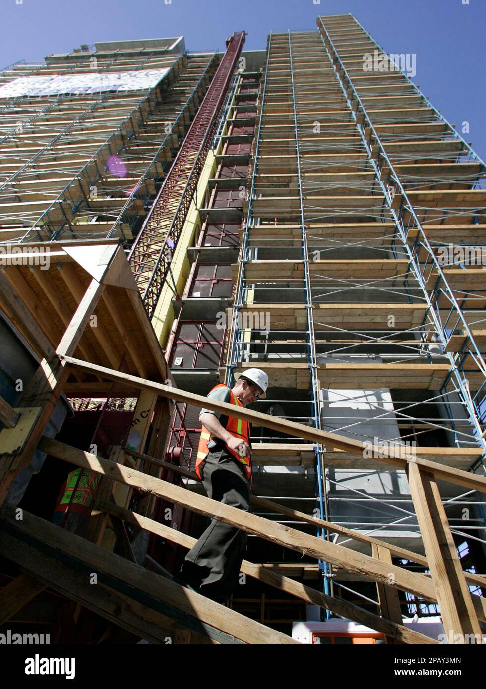 A worker walks down the ramp at the construction site of the Juhl ...