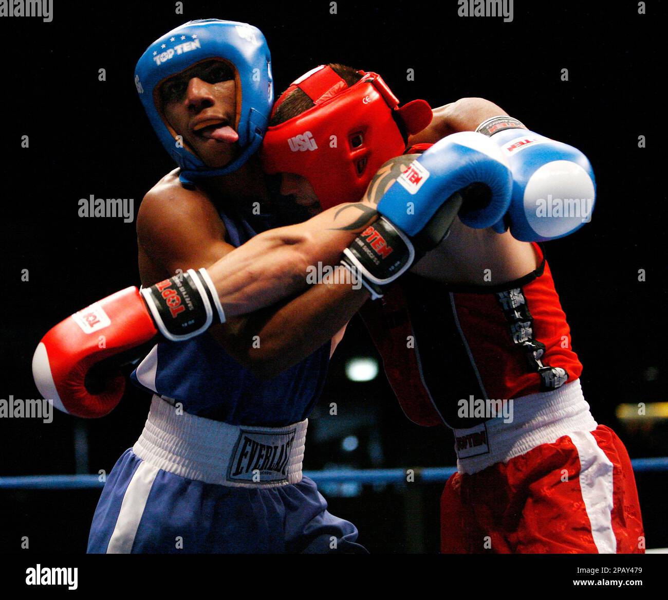 Claudio Marrero, left, of the Dominican Republic, tangles with ...