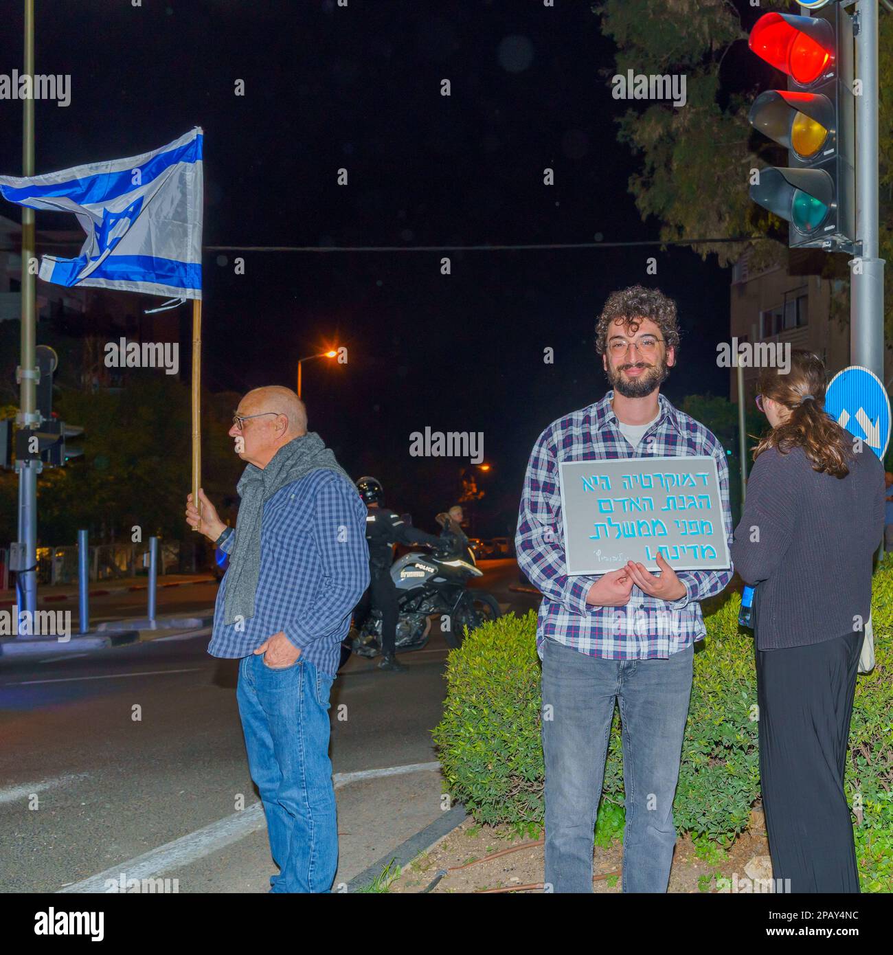 Haifa, Israel - March 11, 2023: Protest march with various signs and ...