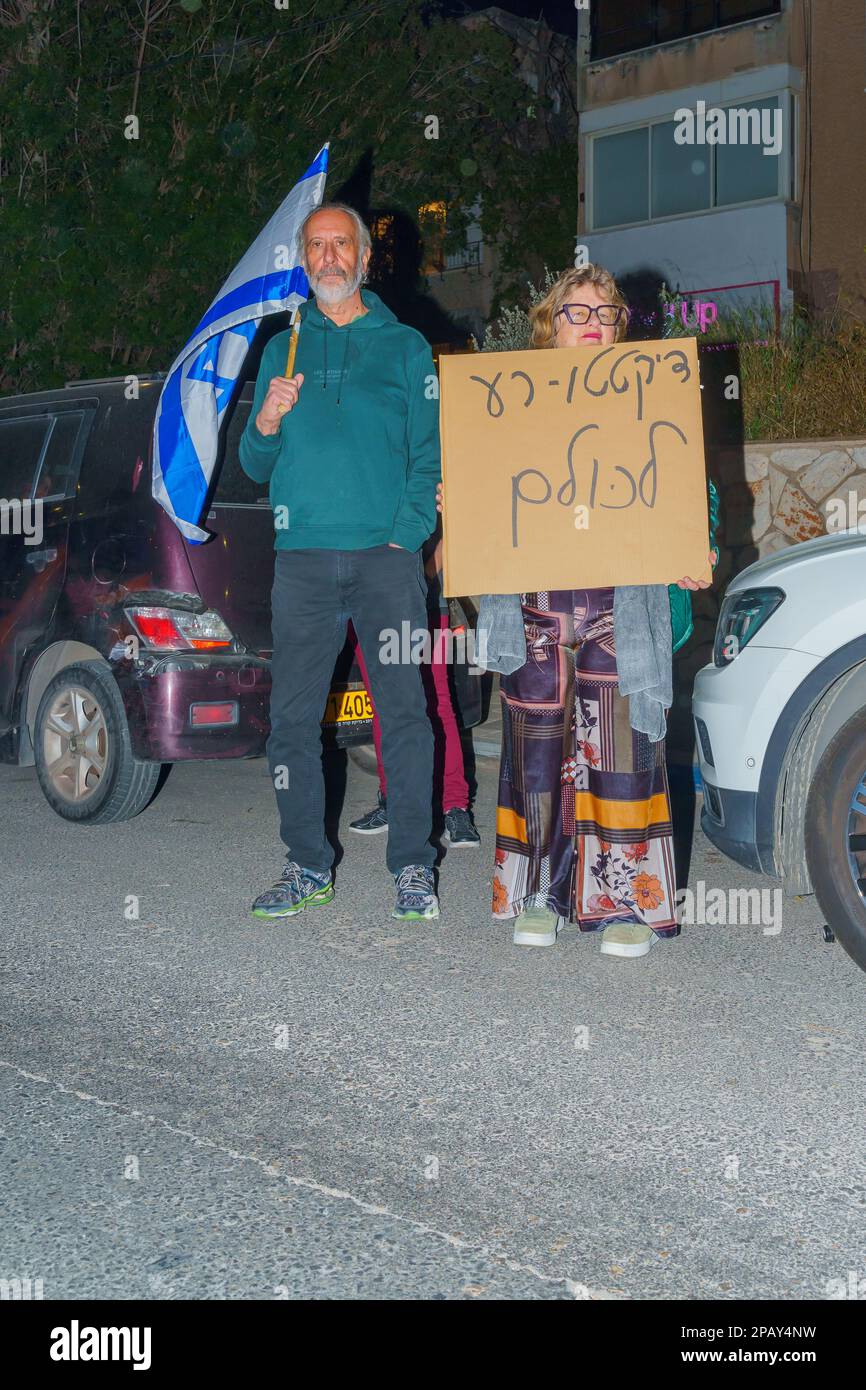 Haifa, Israel - March 11, 2023: Protest march with various signs and ...