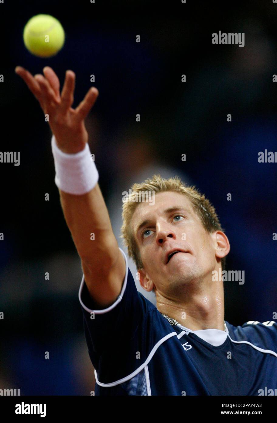 Jarkko Nieminen of Finland returns the ball to Fernando Gonzalez of ...