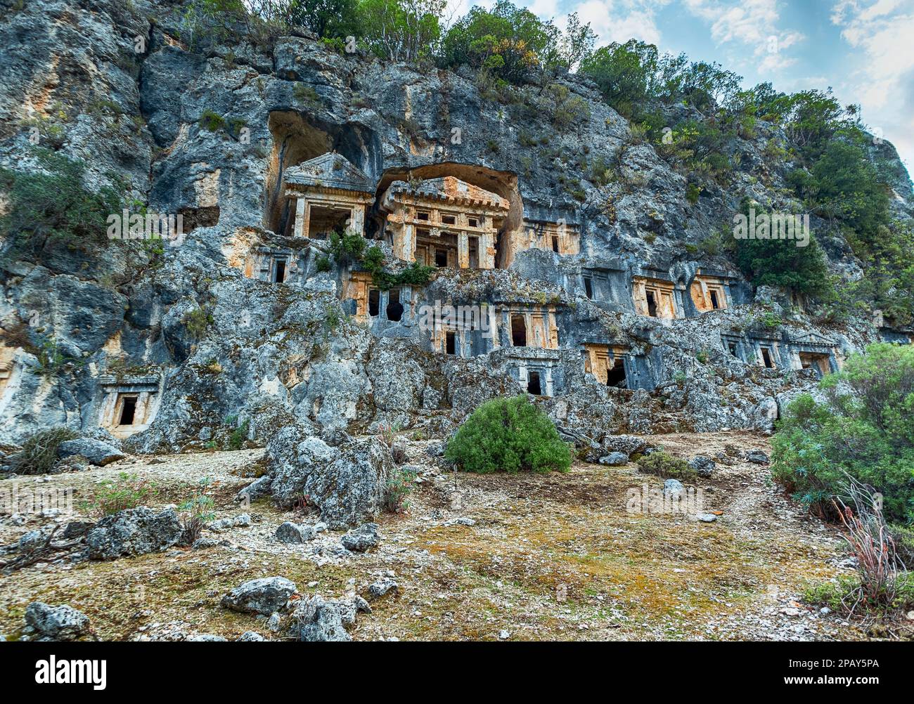 Rock tombs of Pinara ancient city in Lycia, Antalya, Turkey Stock Photo ...
