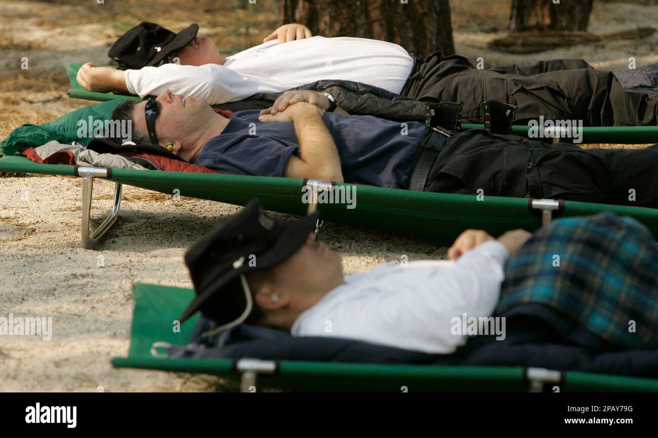 Santa Clara Fire Dept. firefighters, Keith Jyung, bottom, John Boucher ...