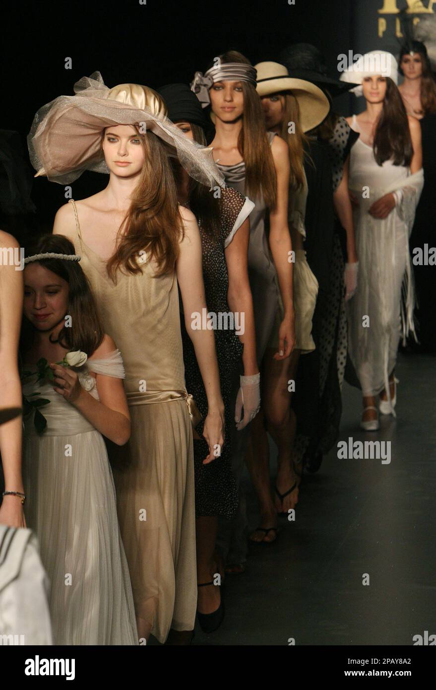 Models present outfits by fashion designer Katerina Karoussos during ...