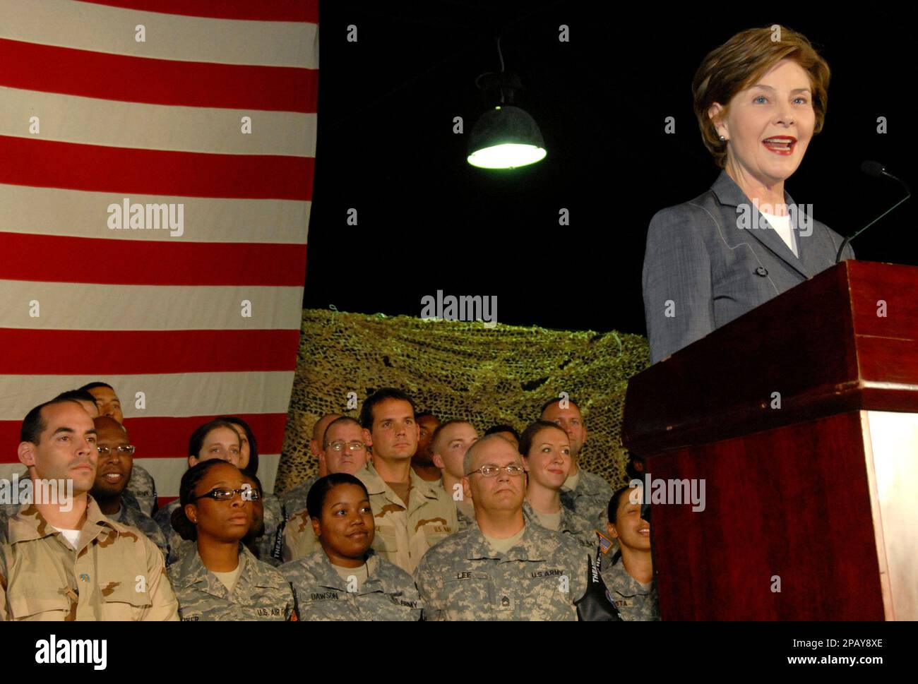 U. S. first lady Laura Bush talks to US military personnel at the Ali ...