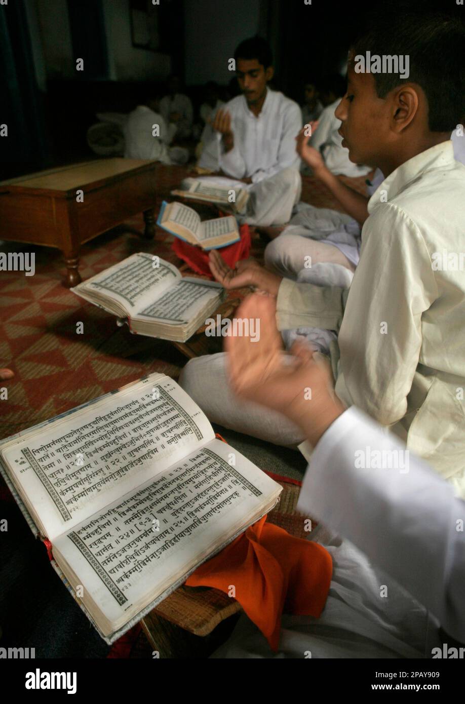 Students study at the Shri Swami Narottamanand Giri Ved Vidyalaya, a ...