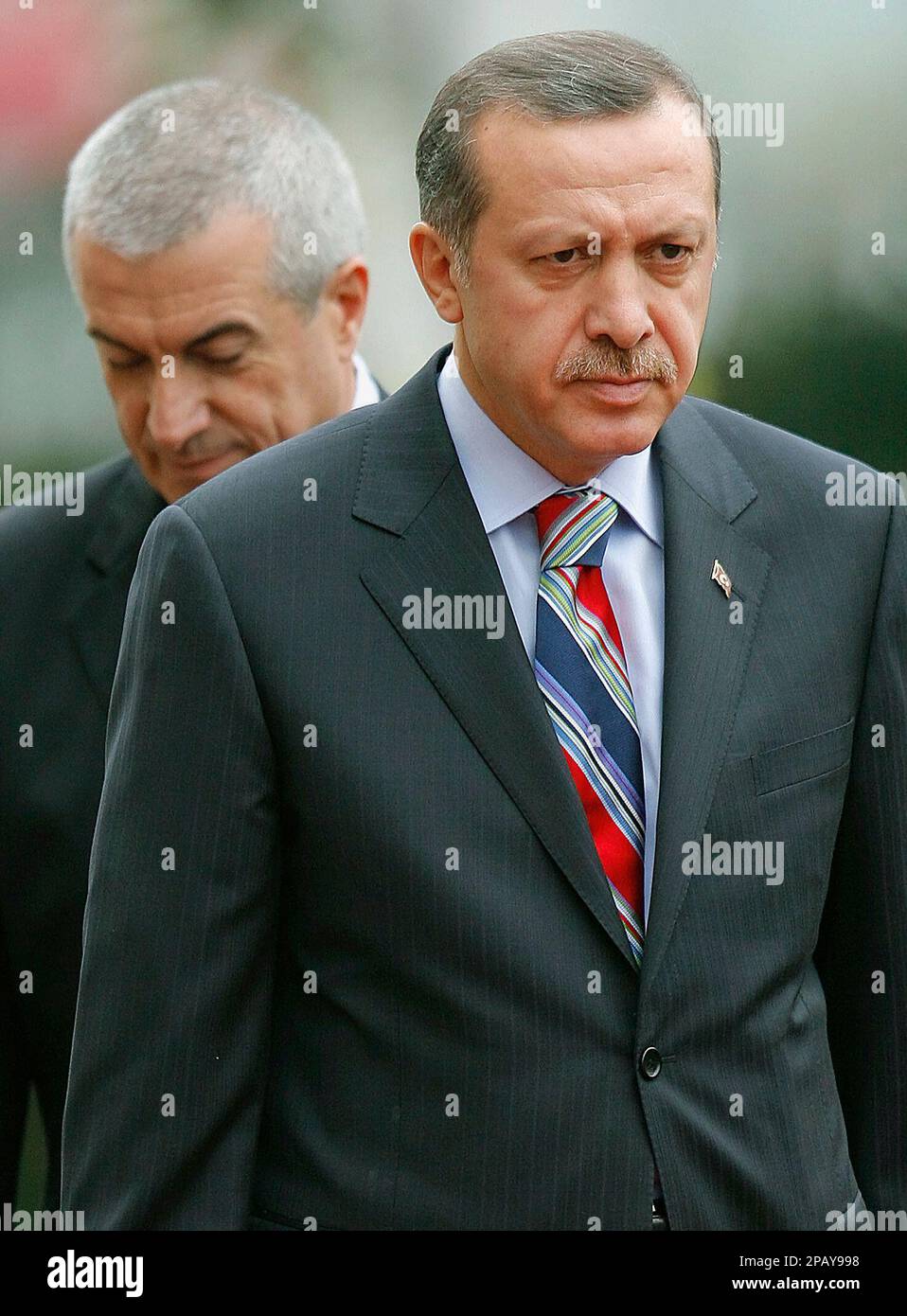 Turkish Prime Minister Recep Tayyip Erdogan, right, walks with Romanian ...