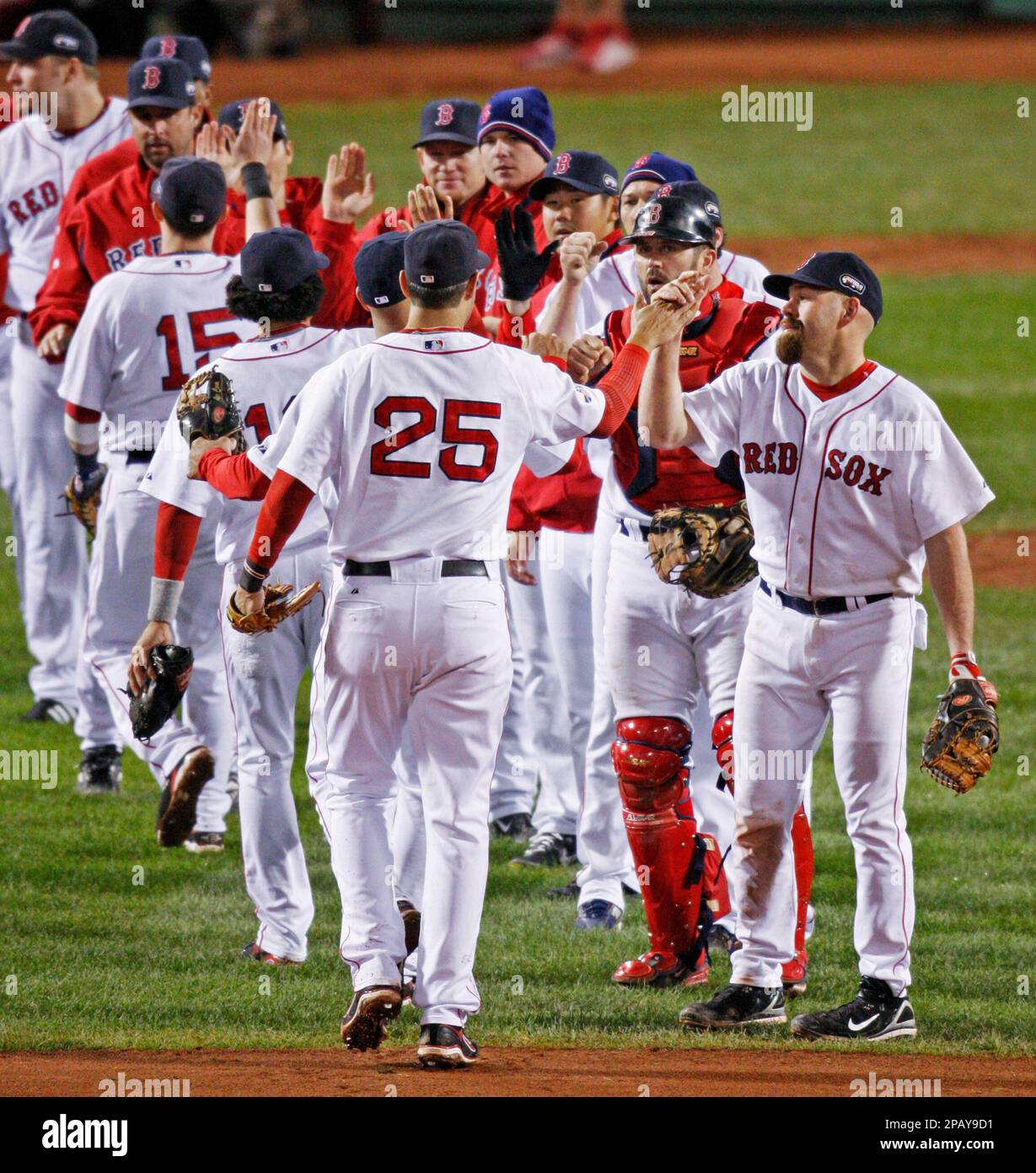 The Boston Red Sox celebrate after Game 1 of the baseball World Series ...