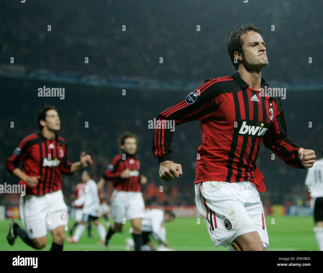 AC Milan forward Alberto Gilardino celebrates after scoring against ...