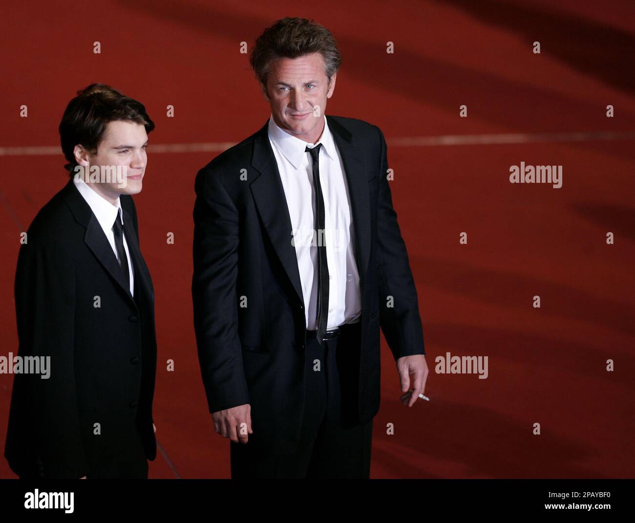 Sean Penn, right, and Emile Hirsch, left, pose for photographers upon ...