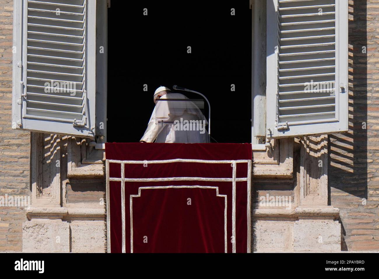 Pope Francis leaves after the Angelus noon prayer from the window of ...