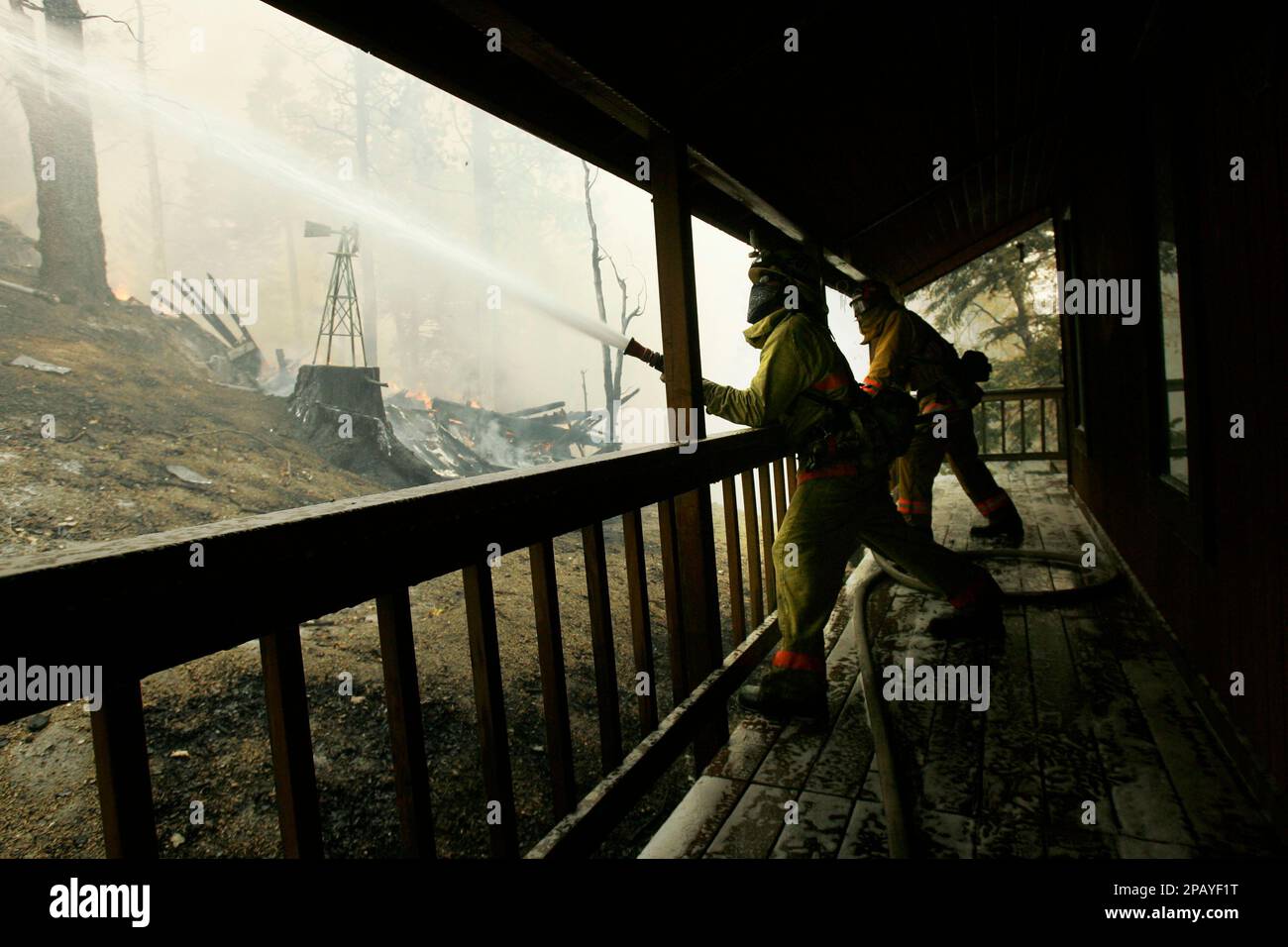 Big Bear Lake Fire Dept. members, Nick Hollenbaugh, left, and Rick ...