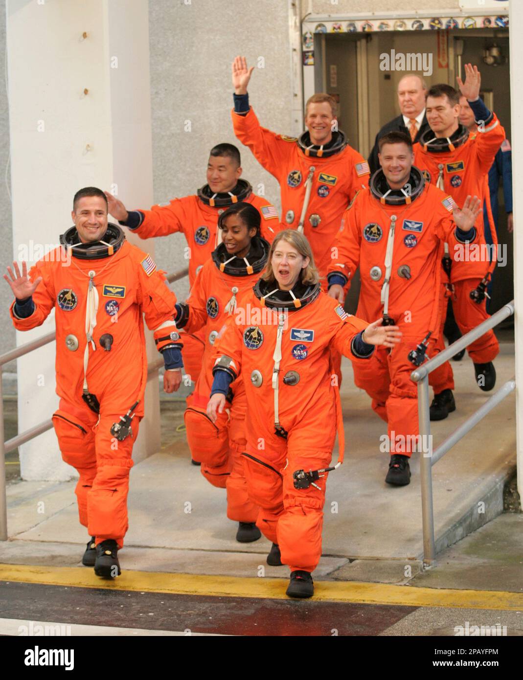 Space Shuttle crew leave the Crew and Check-Out building at the Kennedy ...