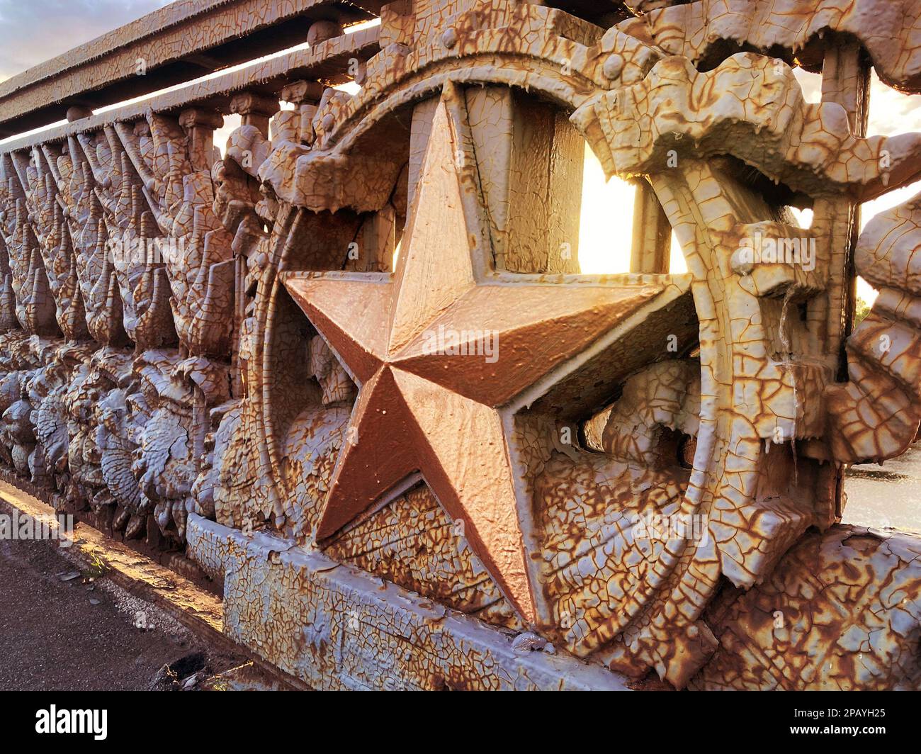 Metal star on the fence. The main symbol of the red Soviet army during ...