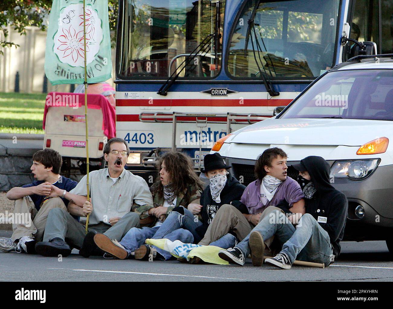 Protesters block a roadway on Capitol Hill in Washington, Monday, Oct ...
