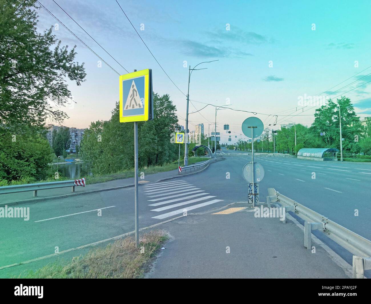 Pedestrian crossing sign board. Crosswalk pictogram sign on the traffic ...