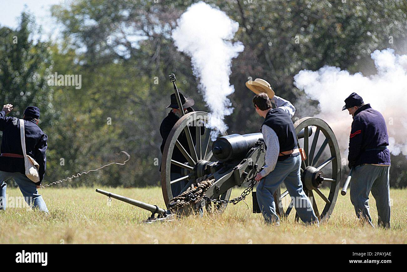 Re-enactors portraying Federal artillery soldiers in the 1863 period ...