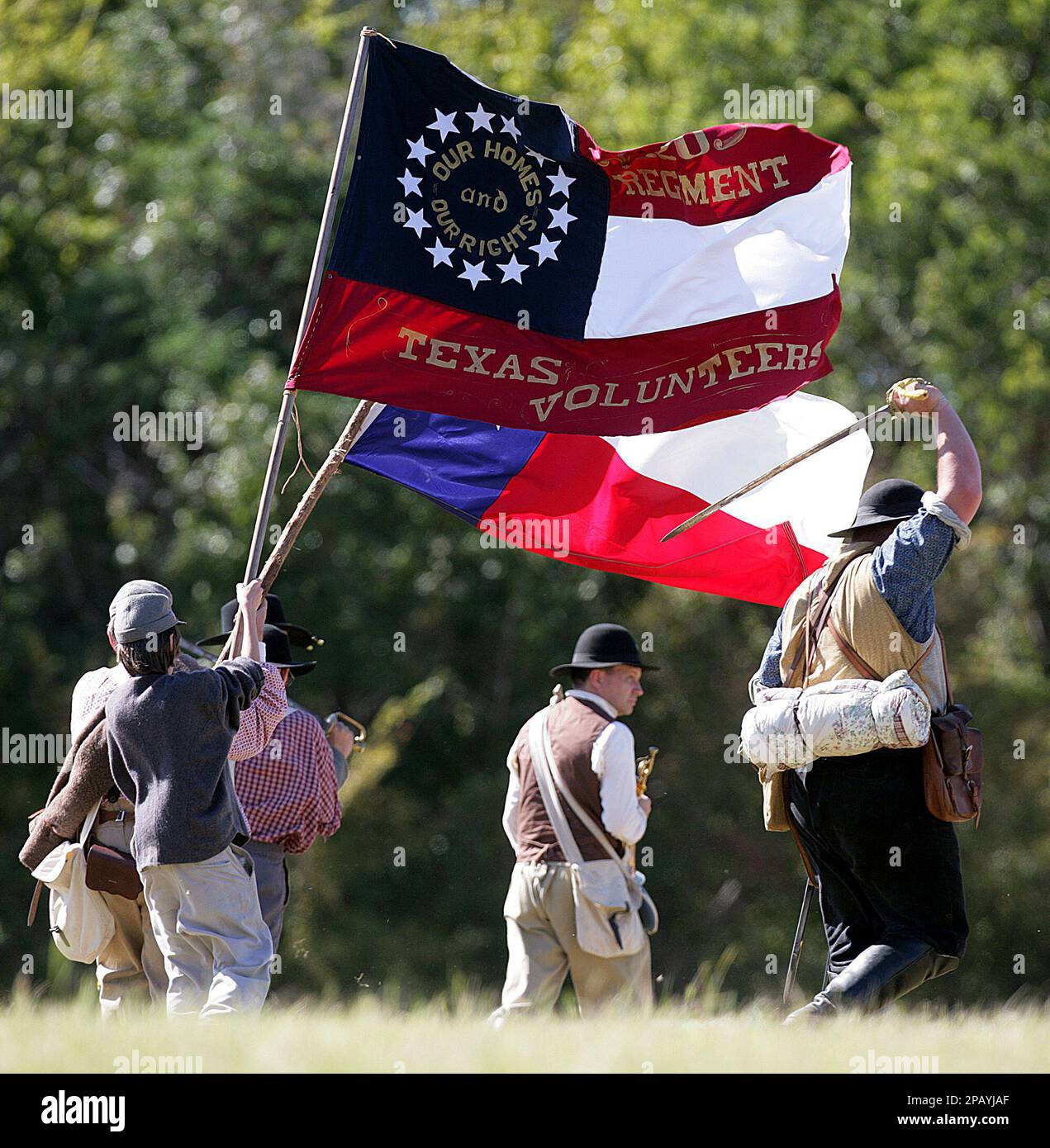 Re-enactors portraying Texas Confederate soldiers in the 1863 period ...