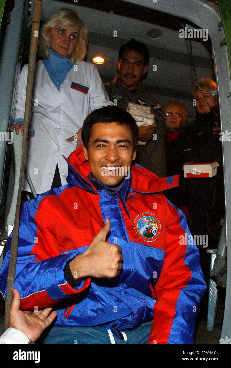 Malaysia's first space traveler Sheikh Muszaphar Shukor gestures ...