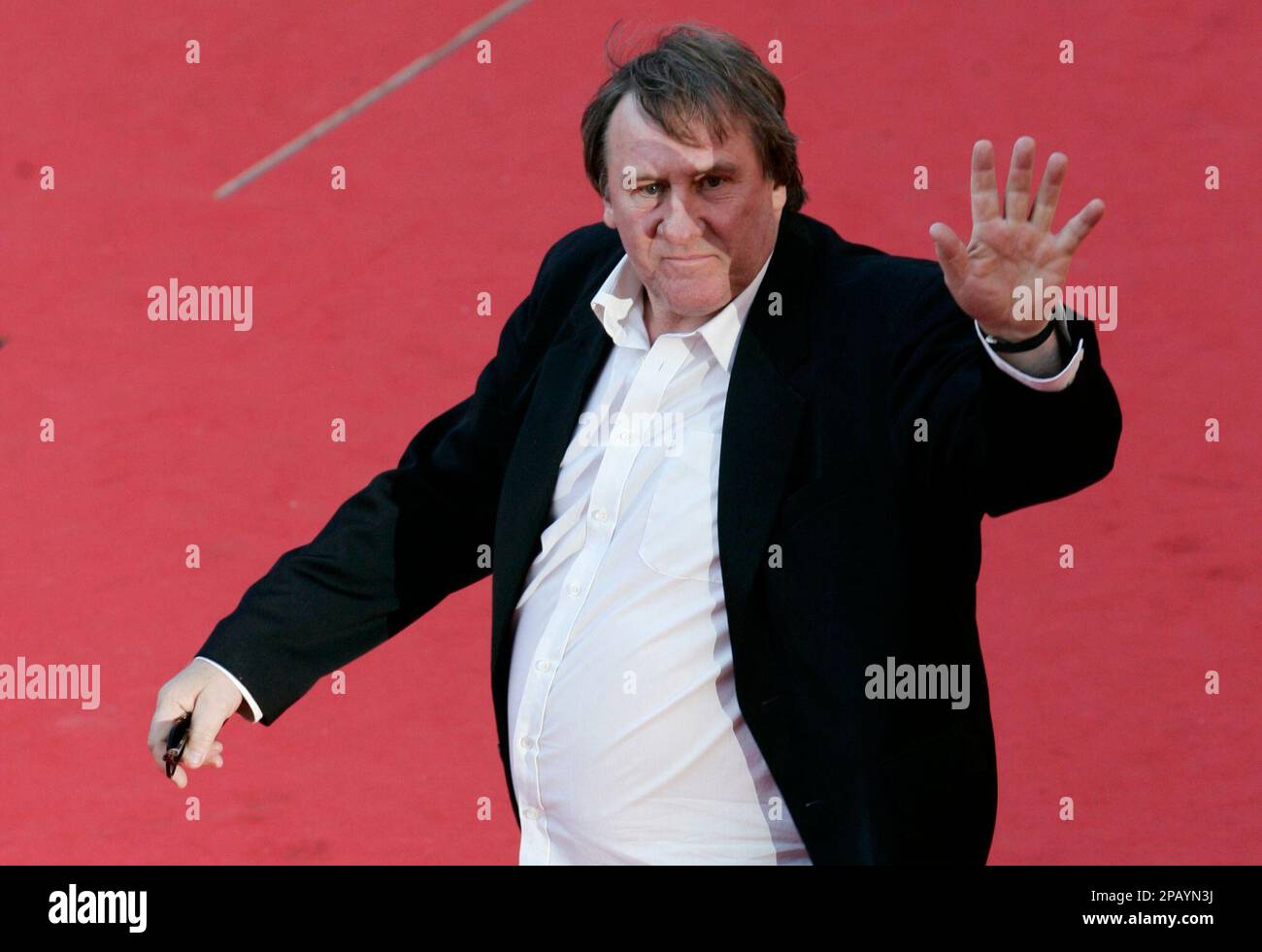 French actor Gerard Depardieu poses for photographers on the red carpet ...