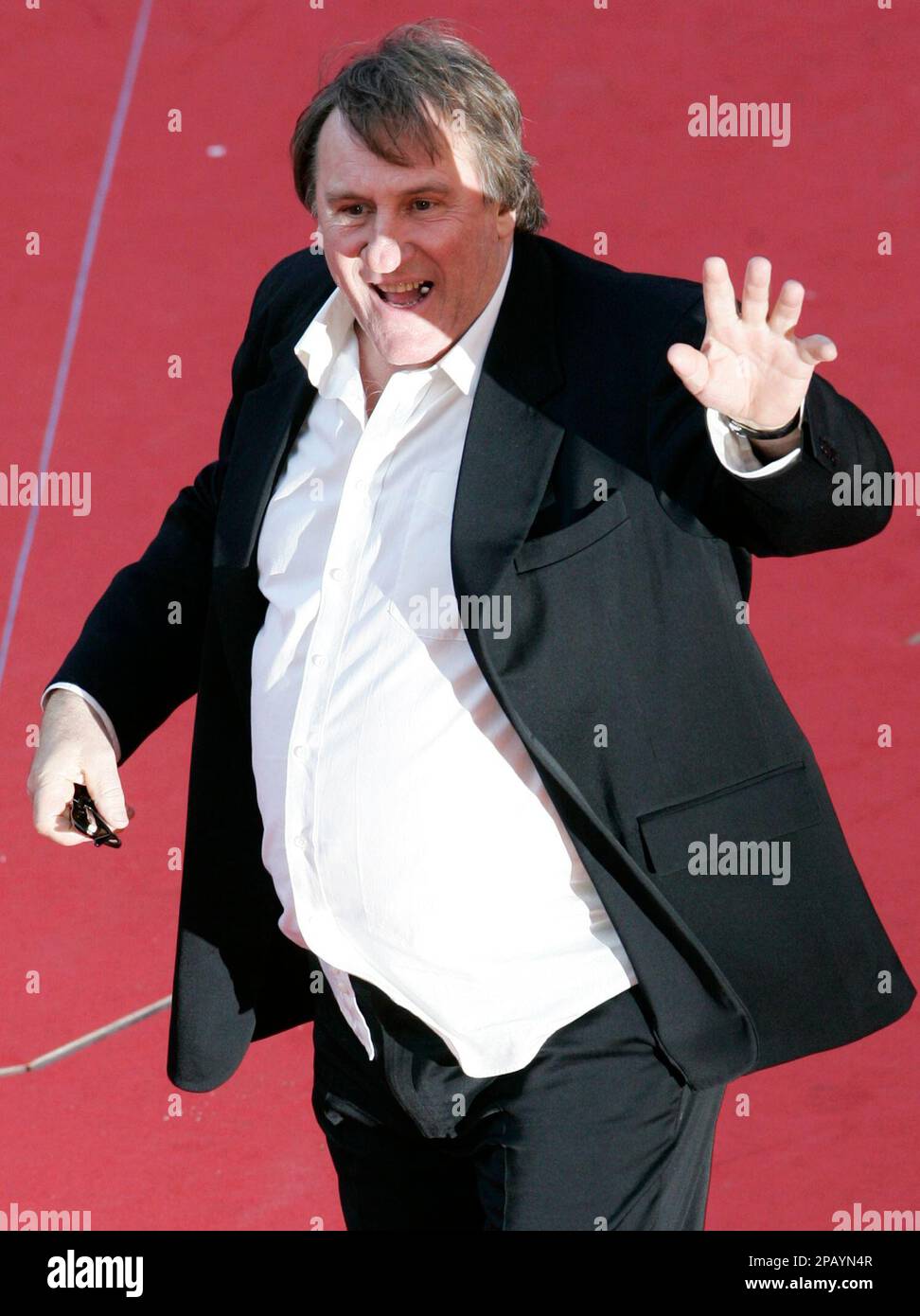 French actor Gerard Depardieu poses for photographers on the red carpet ...