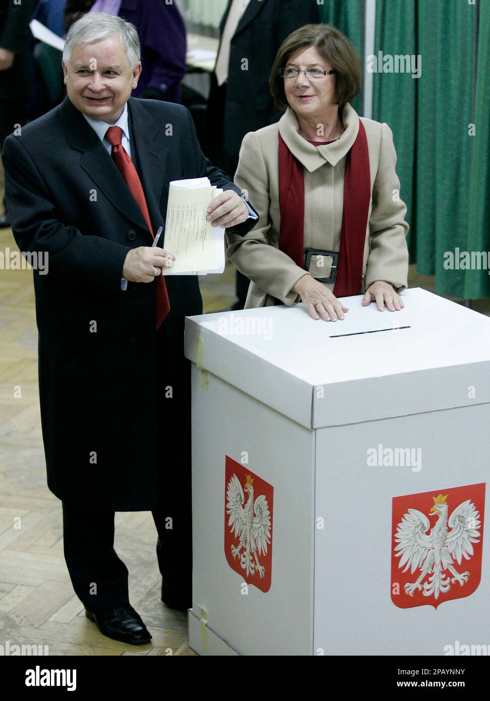 Poland's President Lech Kaczynski, left, and his wife Maria, right ...
