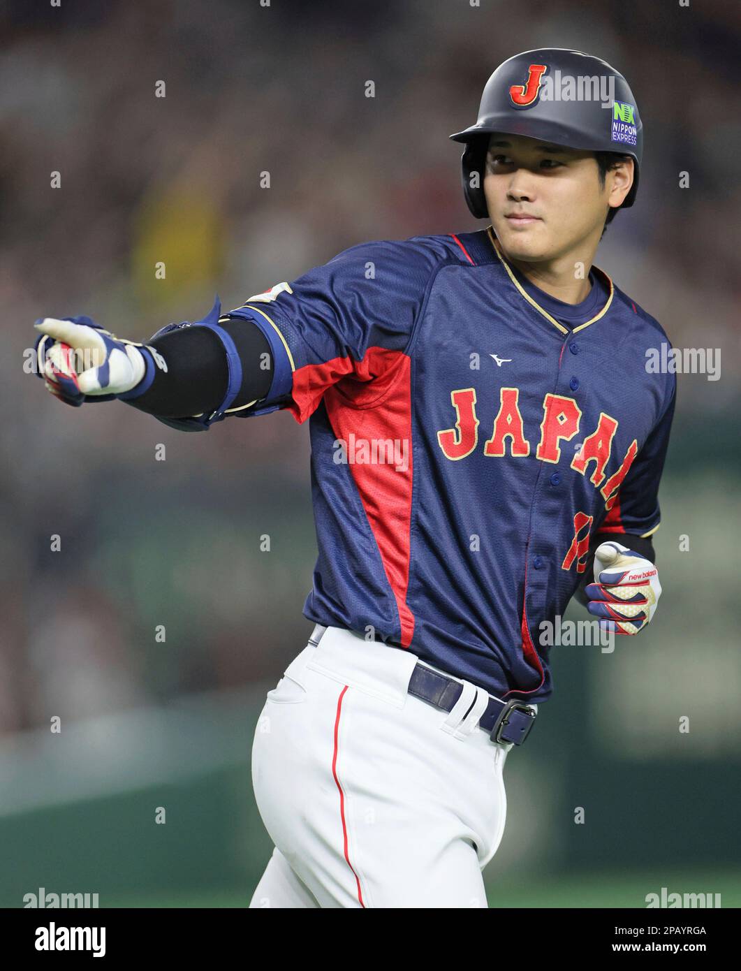 Japan's slugger Shohei Ohtani reacts after opening a three-run homer ...