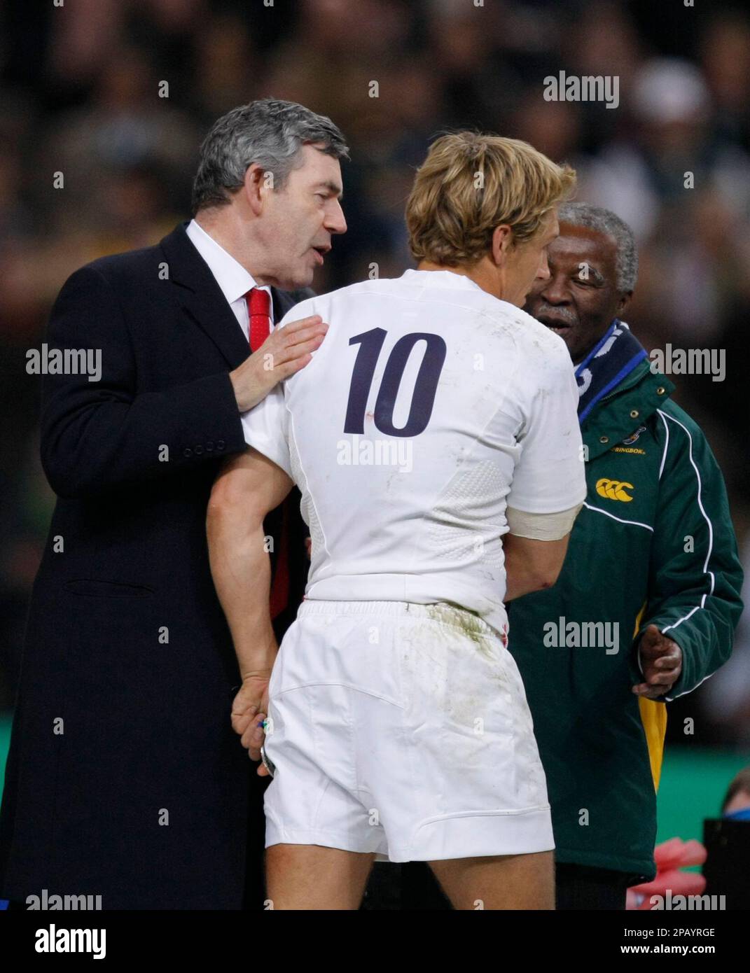 England's Jonny Wilkinson, center, is cheered by Britain's Prime ...