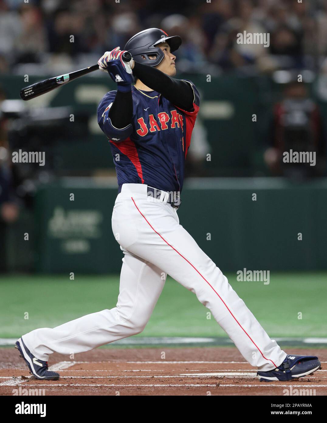 Japan's slugger Shohei Ohtani opens a three-run homer during the first ...