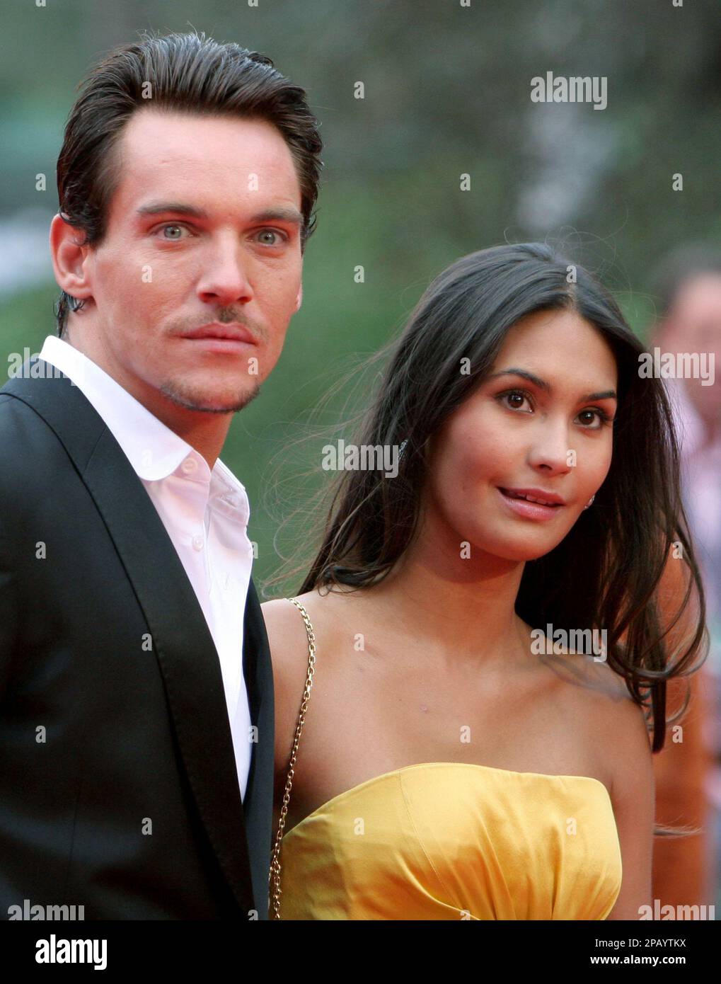 From left, actor Jonathan Rhys Meyers and Reena Hammer look on before ...