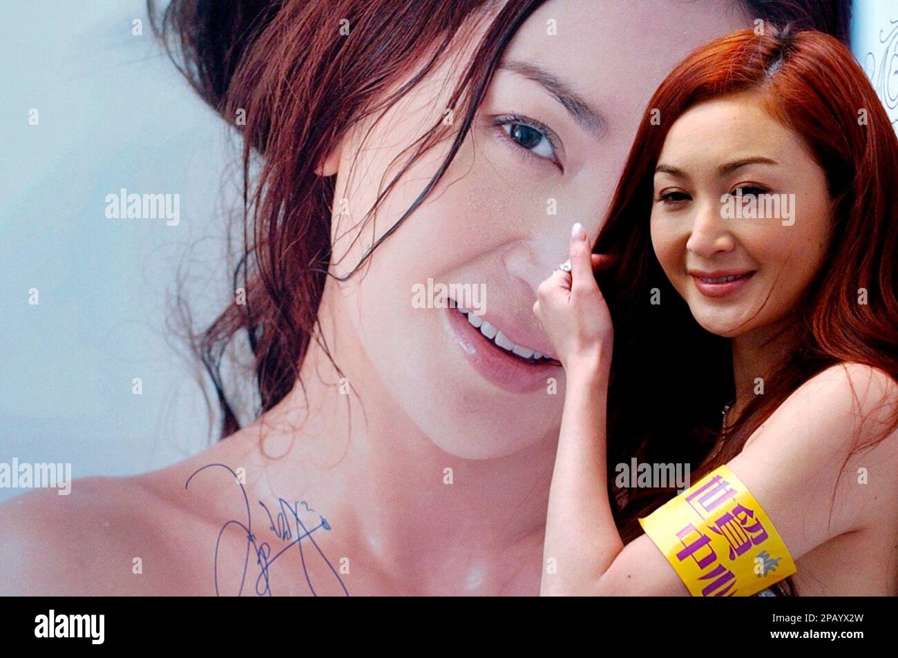 Hong Kong actress Irene Wan poses for photographers to promote her ...