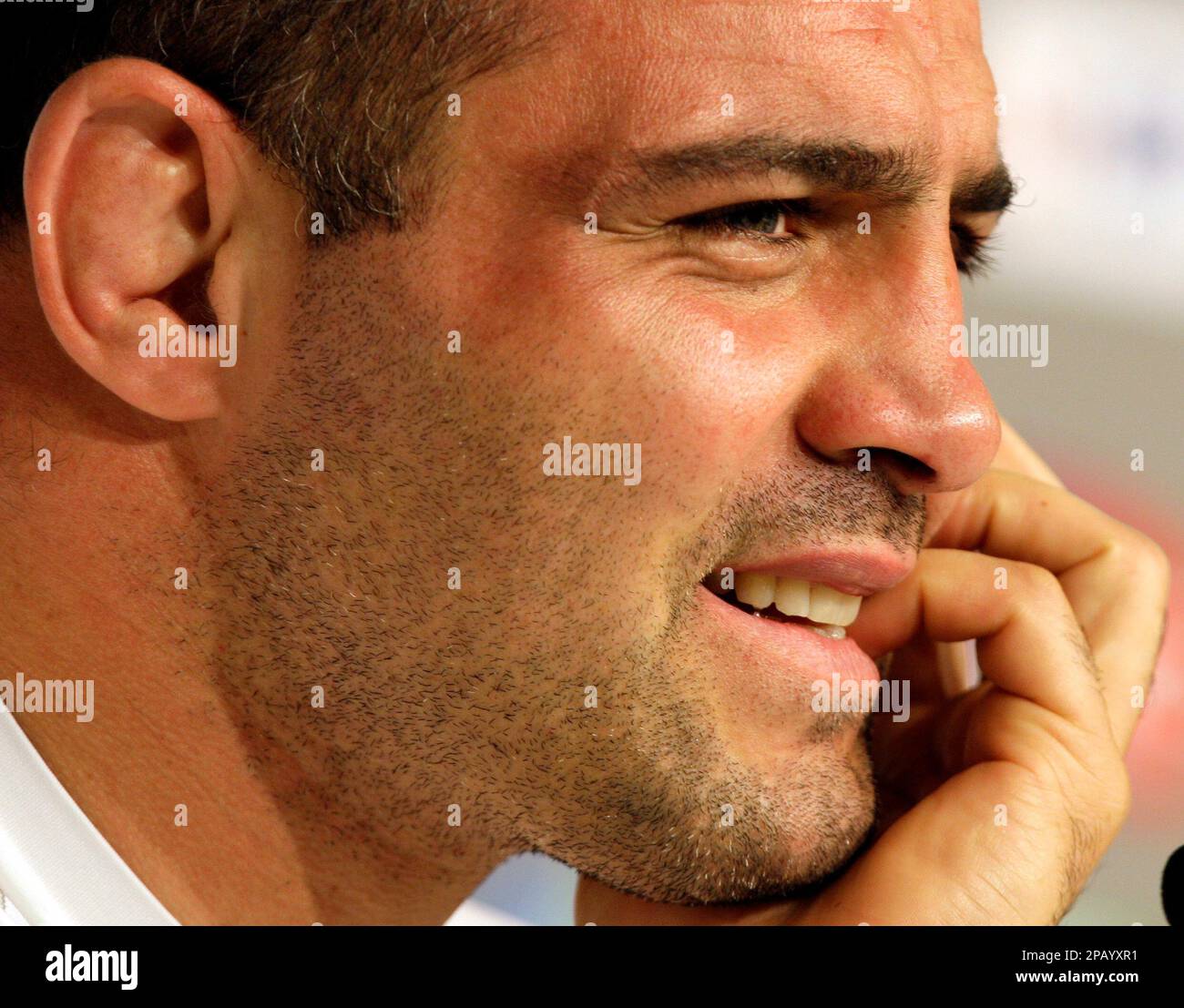 France's team captain c grimaces during a press conference after the ...