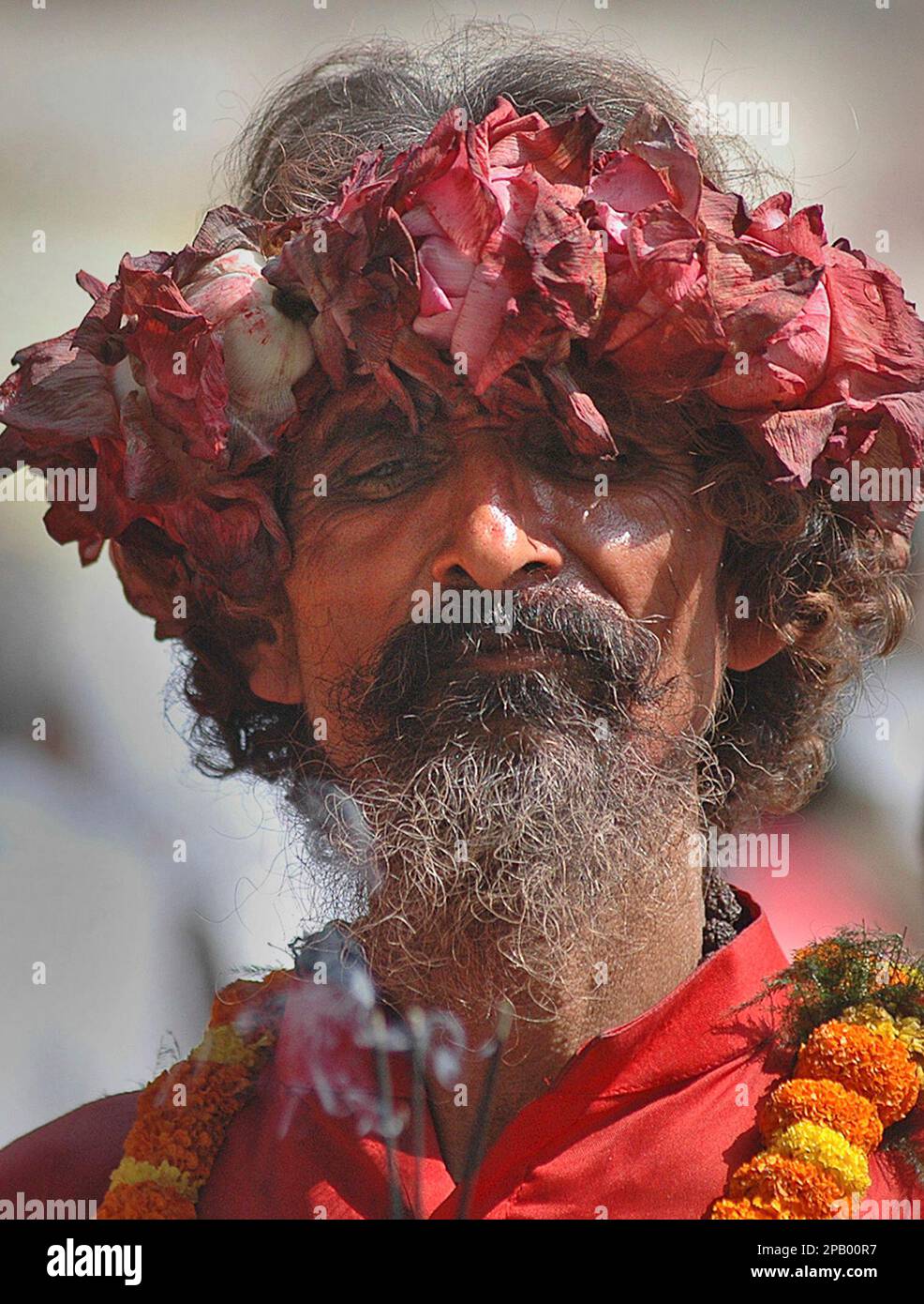 A Hindu devotee walks at the Kamakhya temple during Durga Puja festival ...
